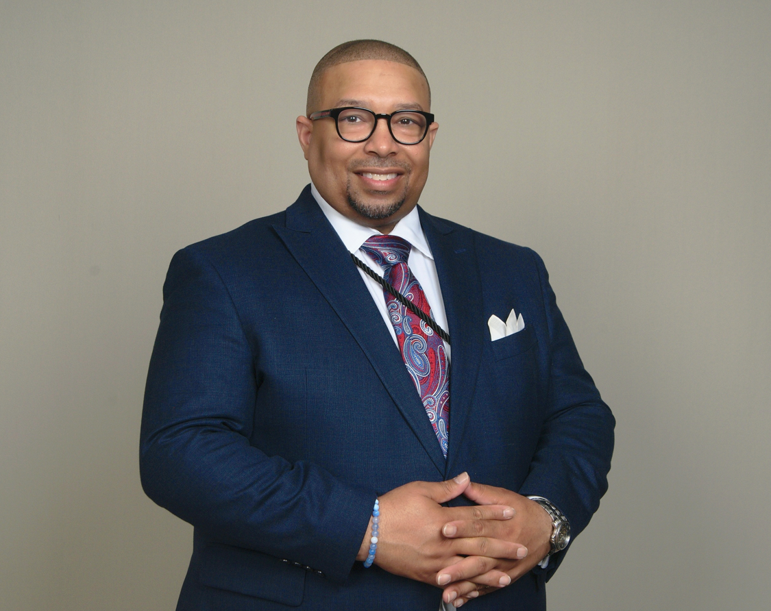 pastor blue smiling side angle cropped – Restoration Temple Church of ...